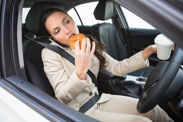 Eating while driving: Bad driving habit you should quit doing - Philippines