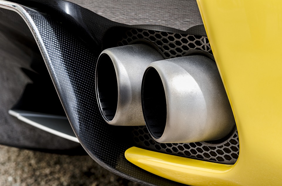 What does a muffler do? How does it differ from a car exhaust?