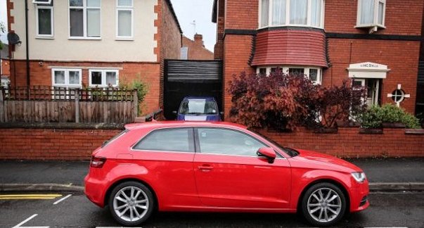 How to stop your neighbor from parking in your driveway?